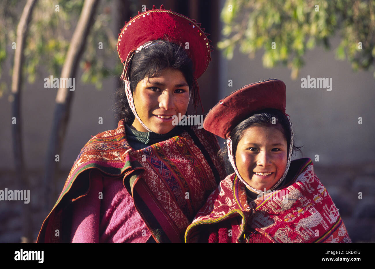 Quechua girls with traditional dress. Ollantaytambo, Peru Stock Photo ...