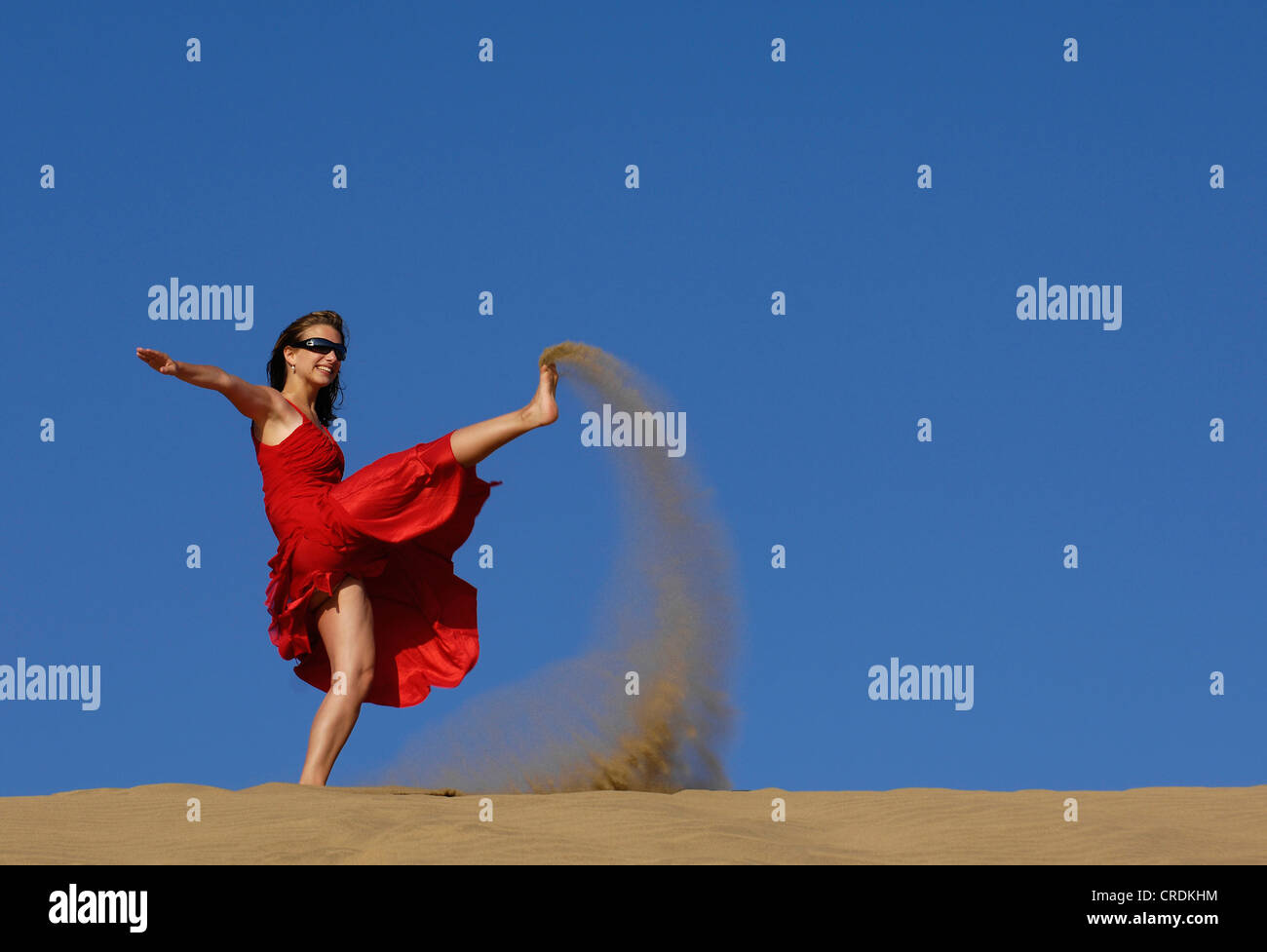 Women kicking sand hi-res stock photography and images - Alamy