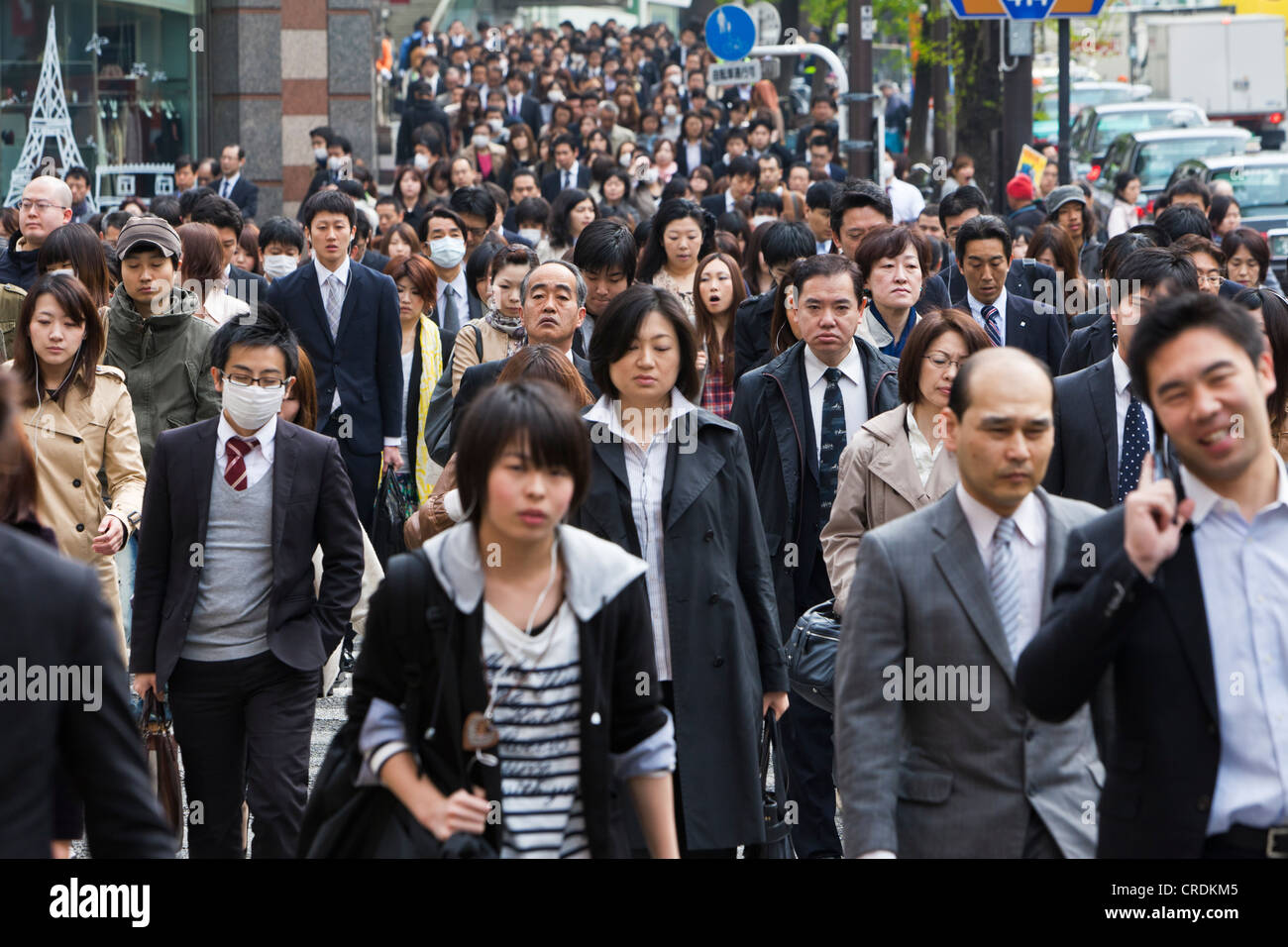 Pedestrians during the morning rush hour in the business district of ...