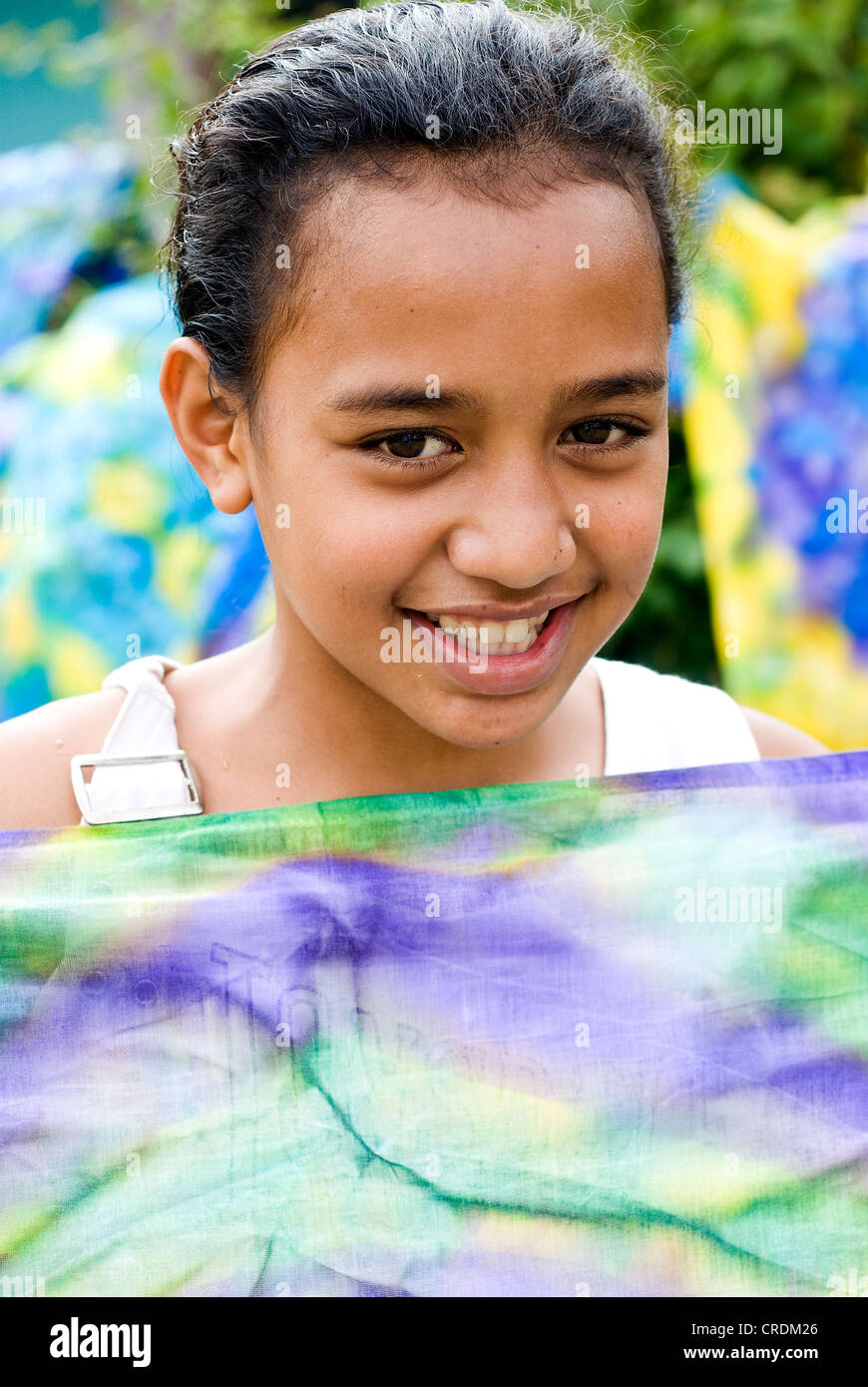 girl with tie dye pareu cloth on Atiu Cook Islands Stock Photo - Alamy