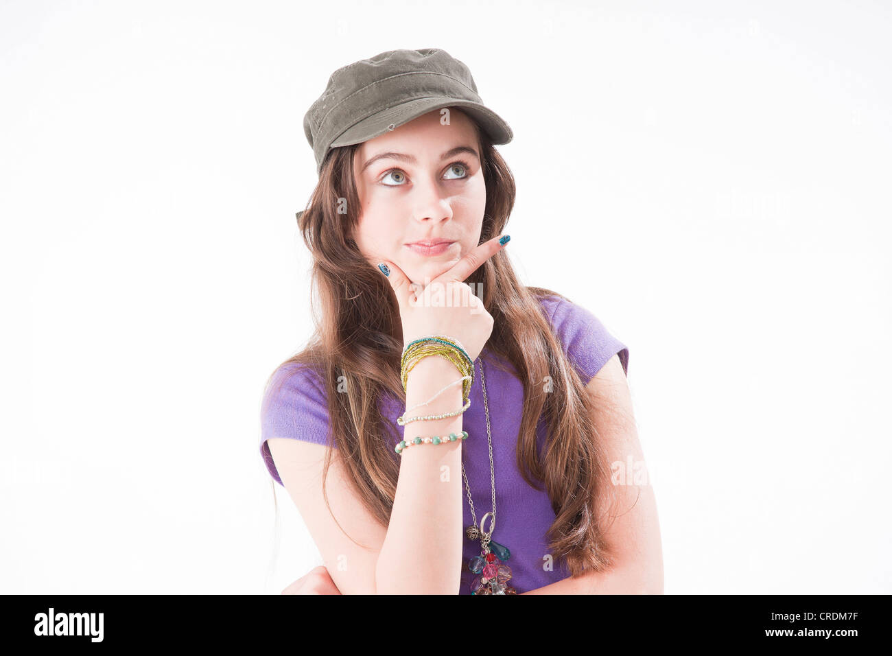Teenage girl looking thoughtful Stock Photo - Alamy