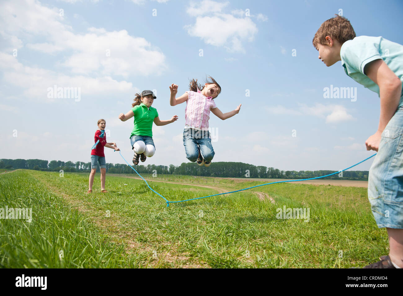 Friends skipping hi-res stock photography and images - Alamy