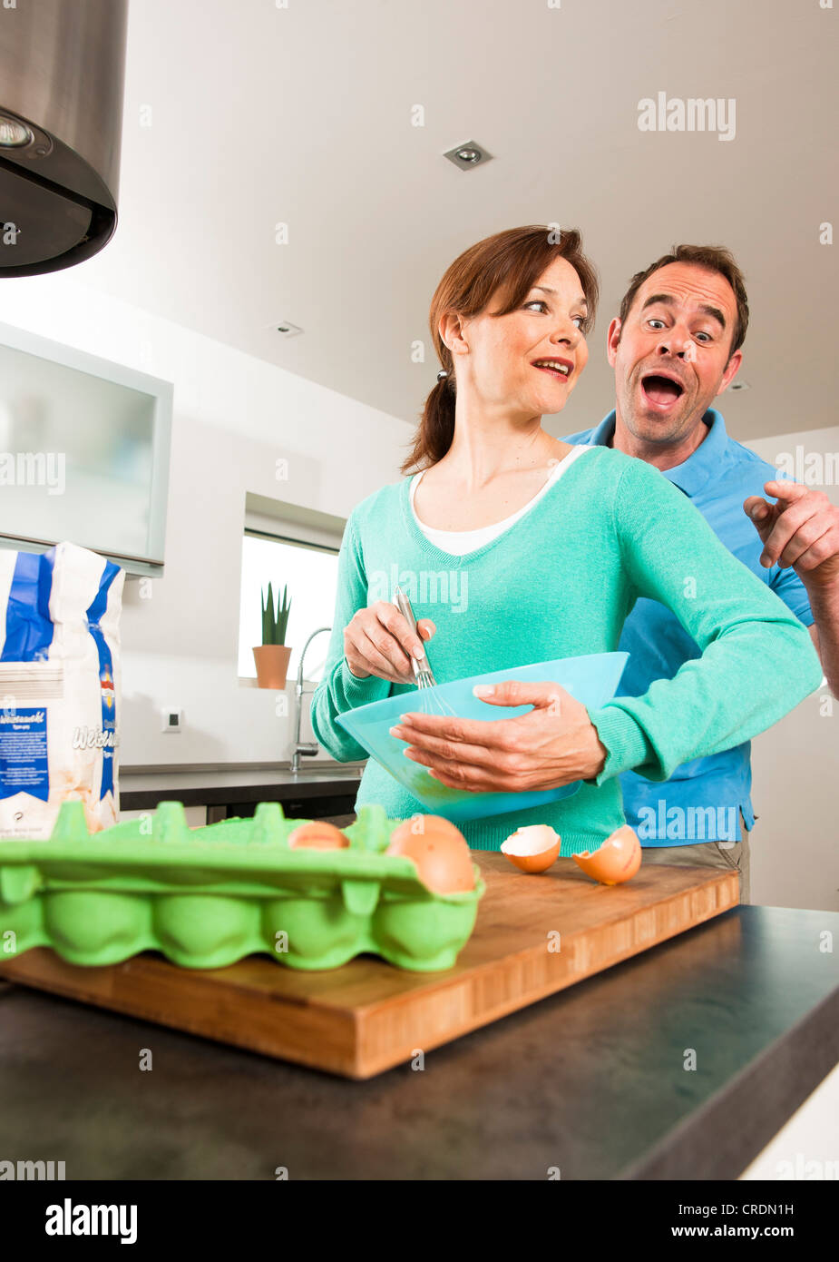 Mixing up something in bowls hi-res stock photography and images - Alamy