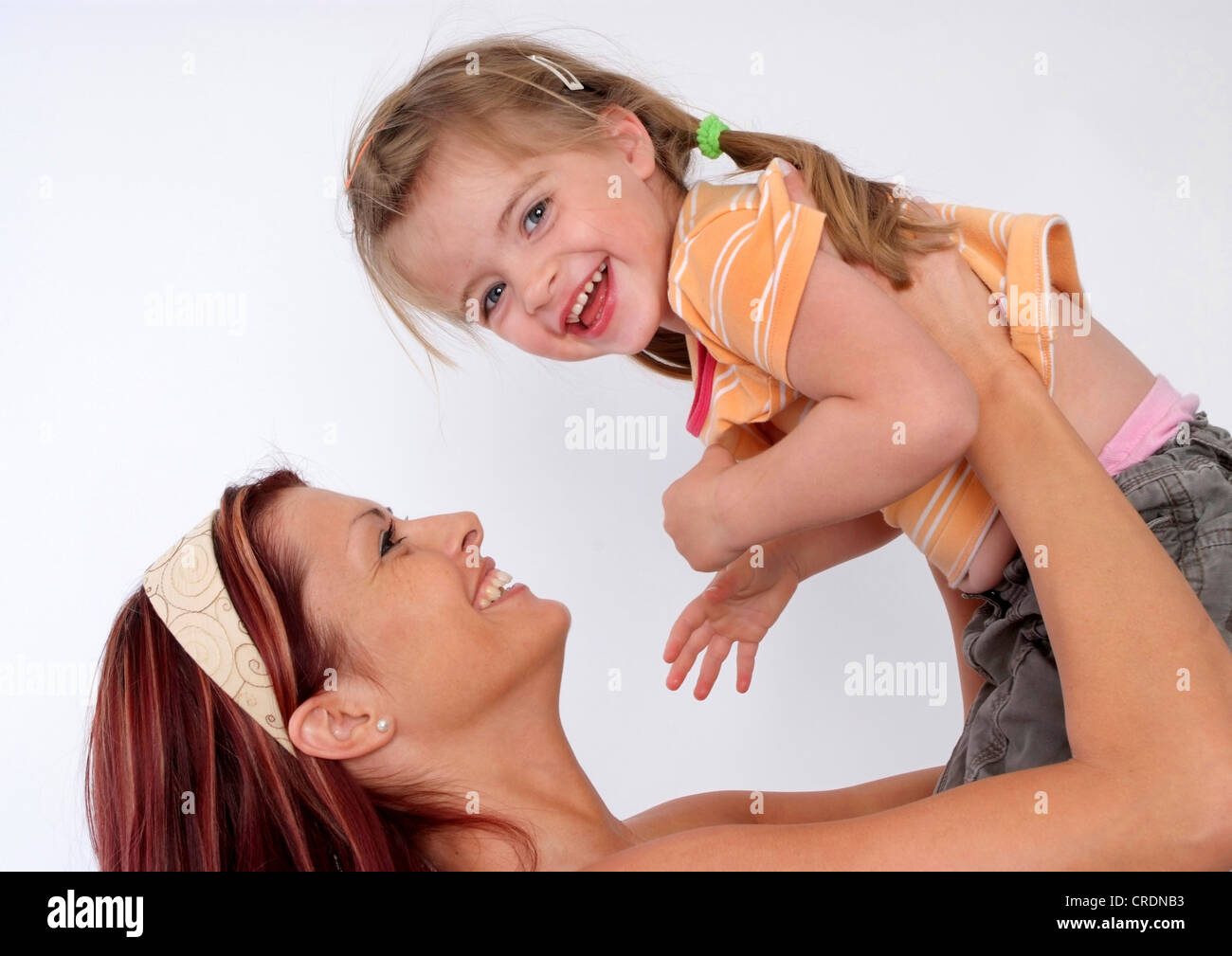 smiling mother and daughter Stock Photo - Alamy