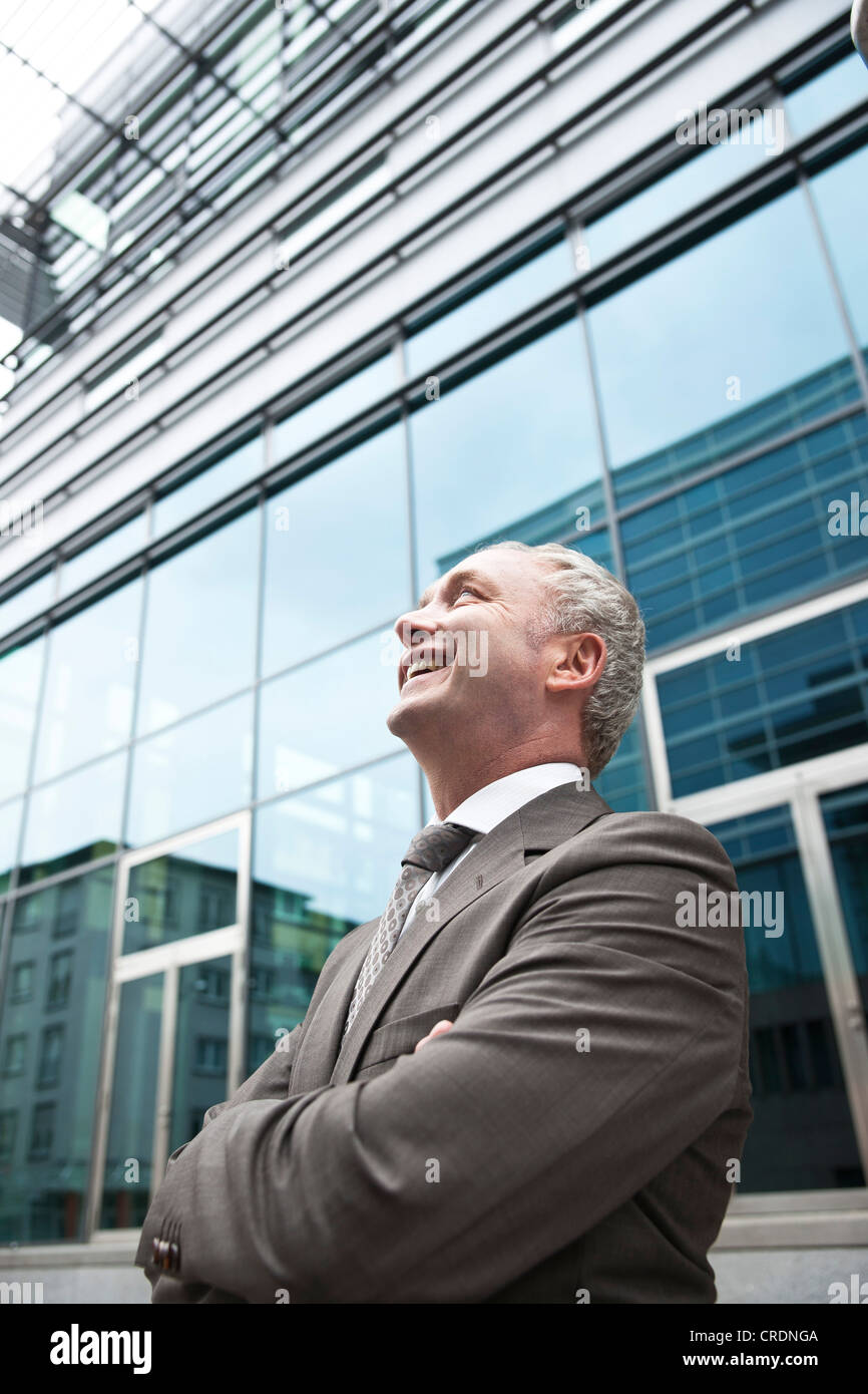 Man in front glass facade hi-res stock photography and images - Alamy