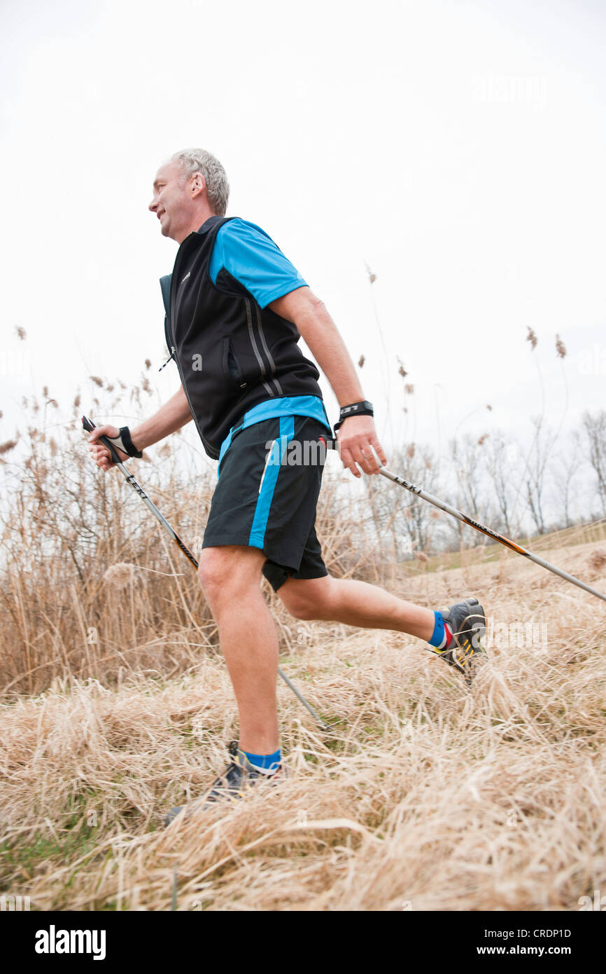 Man doing nordic walking Stock Photo - Alamy Man doing nordic walking Stock Photo - Alamy
