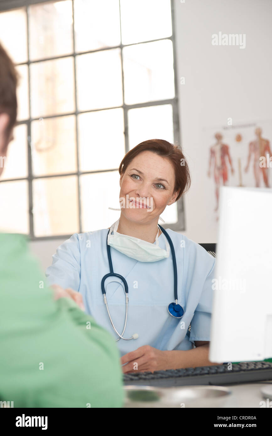 Female doctor patient consultation hi-res stock photography and images ...