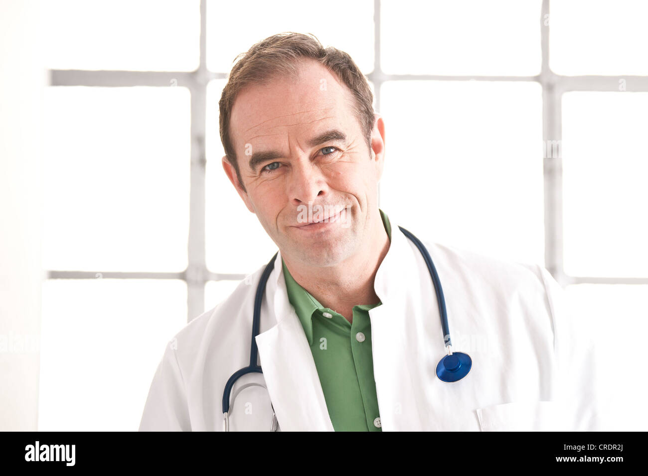 Portrait of a smiling doctor Stock Photo - Alamy