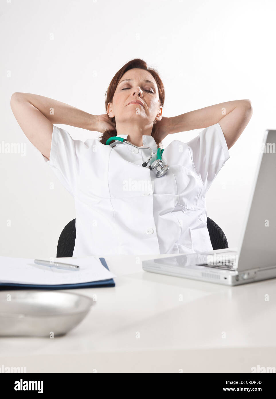 Tired doctor hi-res stock photography and images - Alamy