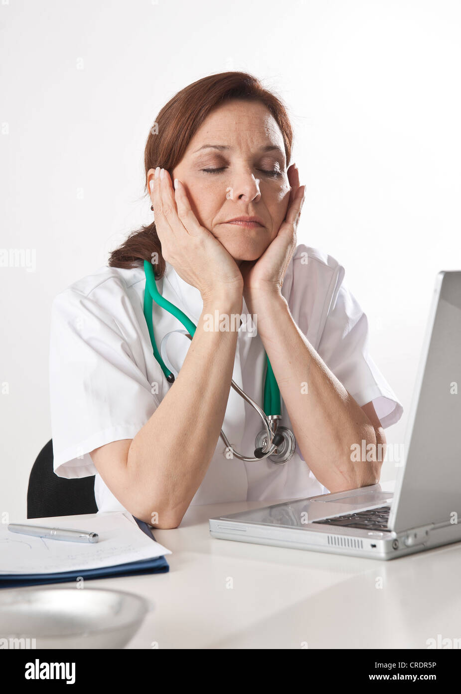 Tired doctor hi-res stock photography and images - Alamy