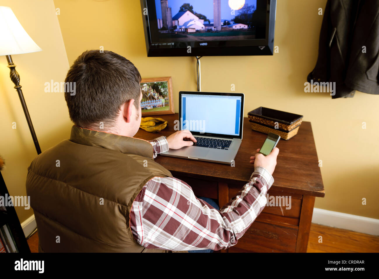 FARMER IN HOME OFFICE USING LAPTOP COMPUTER; WORKING FROM HOME Stock ...