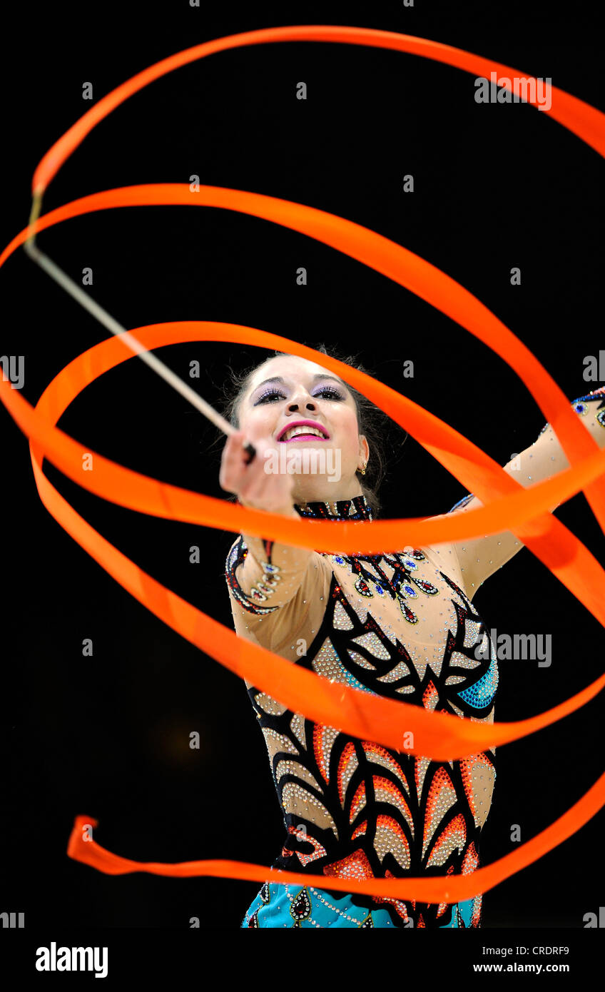woman doing rhythmic gymnastics with rope Stock Photo - Alamy