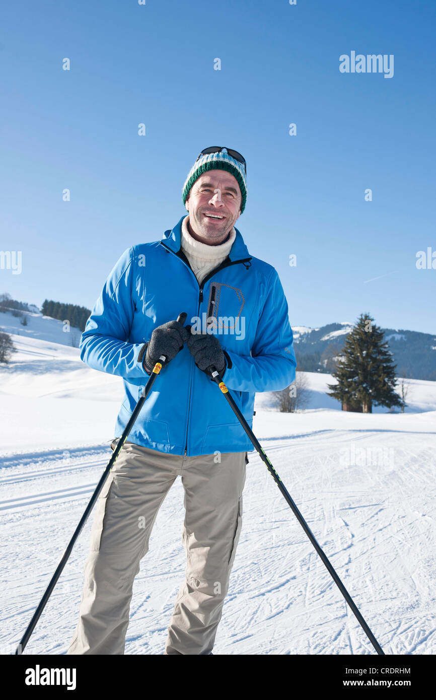Cross-country skiing man Stock Photo - Alamy