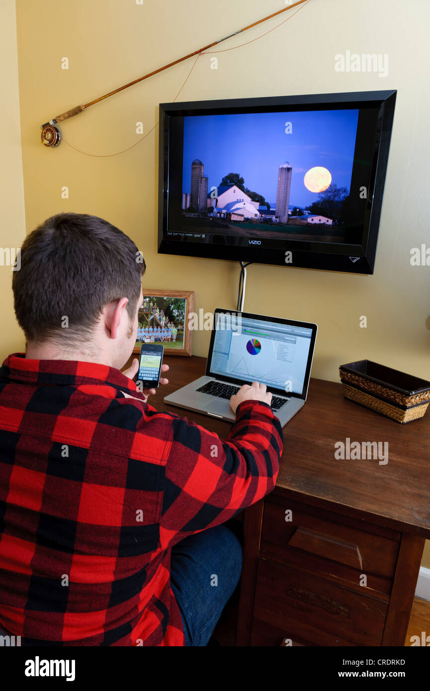 FARMER IN HOME OFFICE USING LAPTOP COMPUTER; WORKING FROM HOME Stock ...