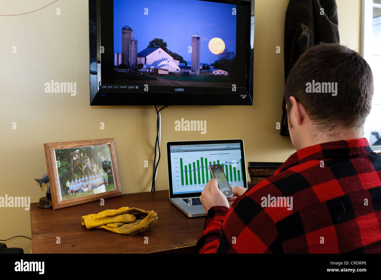 FARMER IN HOME OFFICE USING LAPTOP COMPUTER; WORKING FROM HOME Stock ...