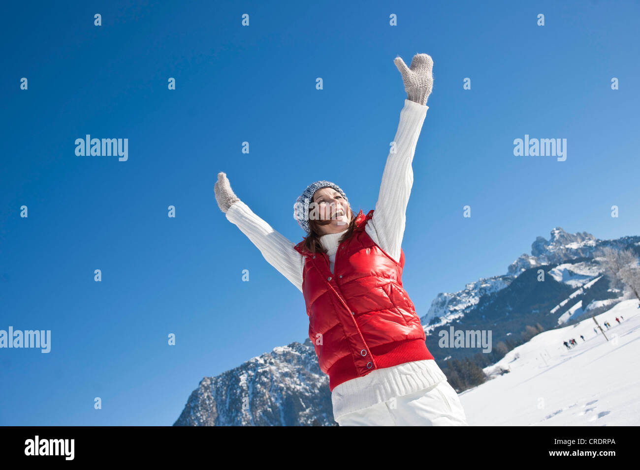 Woman dancing in the snow Stock Photo - Alamy