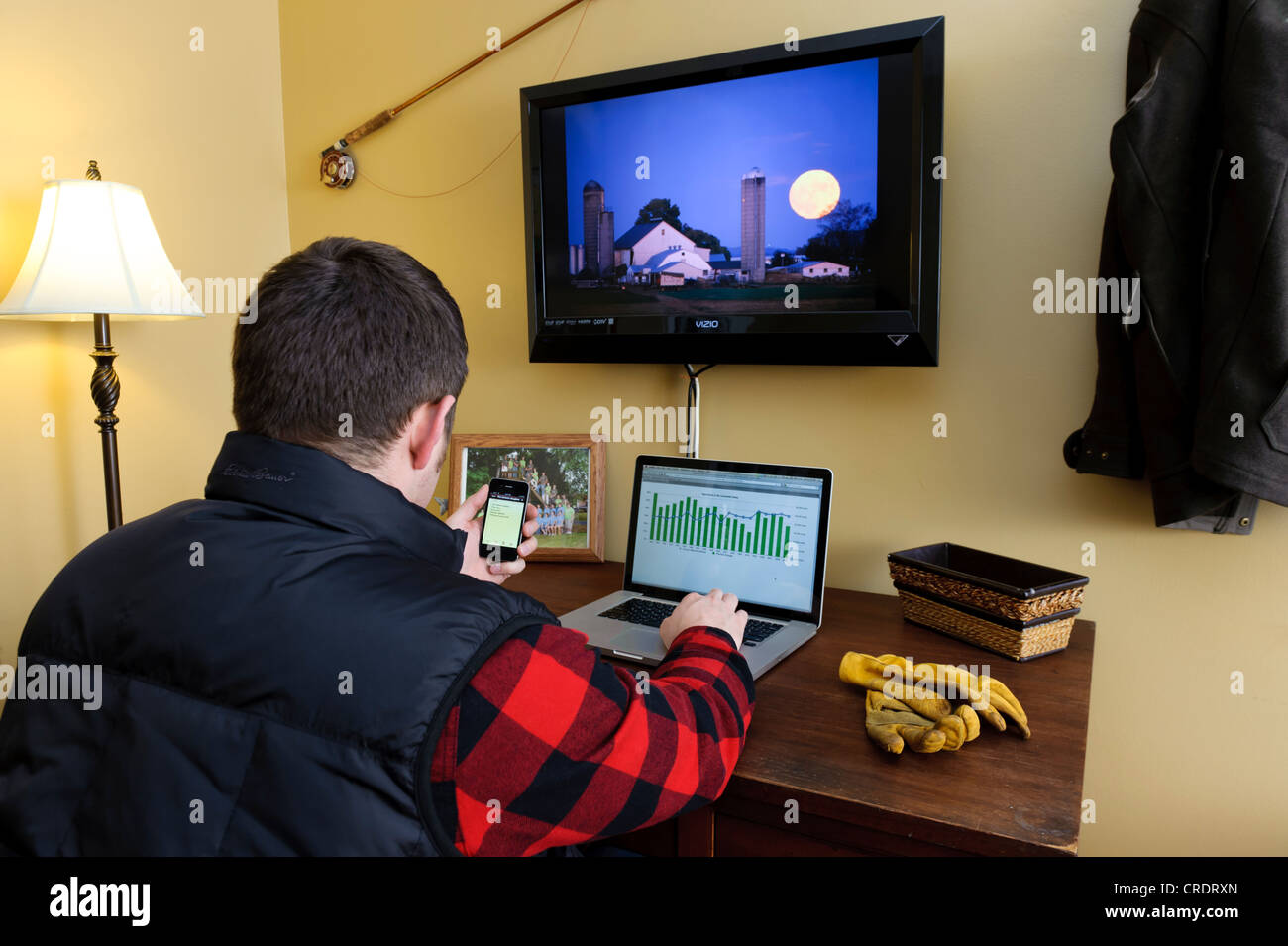 FARMER IN HOME OFFICE USING LAPTOP COMPUTER; WORKING FROM HOME Stock ...