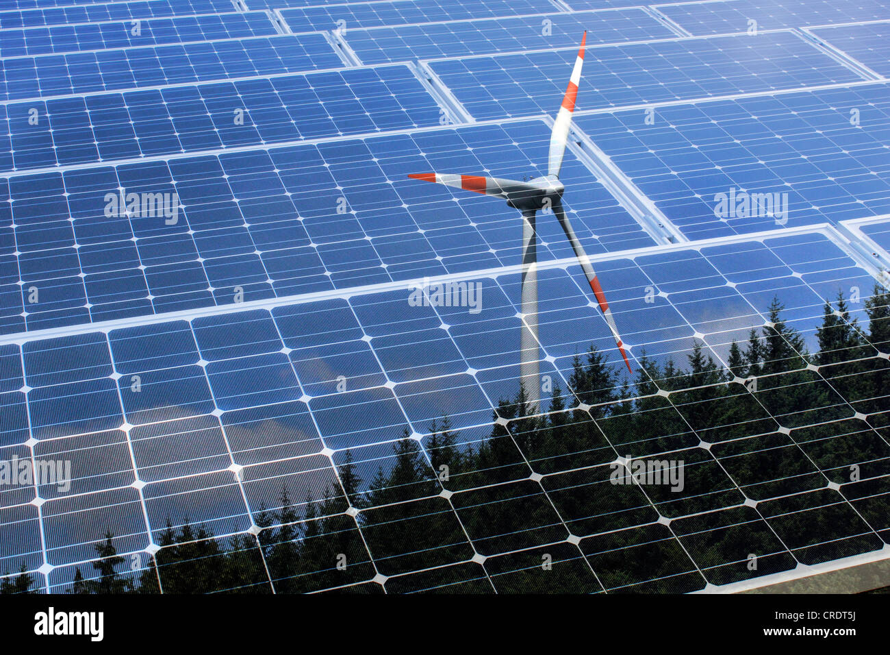 Solar panels with the reflection of a wind turbine, illustration ...
