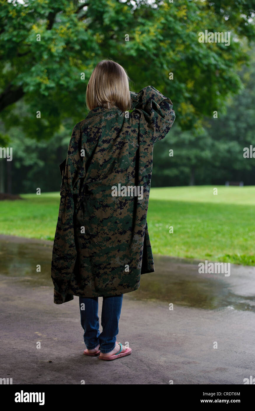 YOUNG GIRL WEARING MILITARY JACKET Stock Photo - Alamy