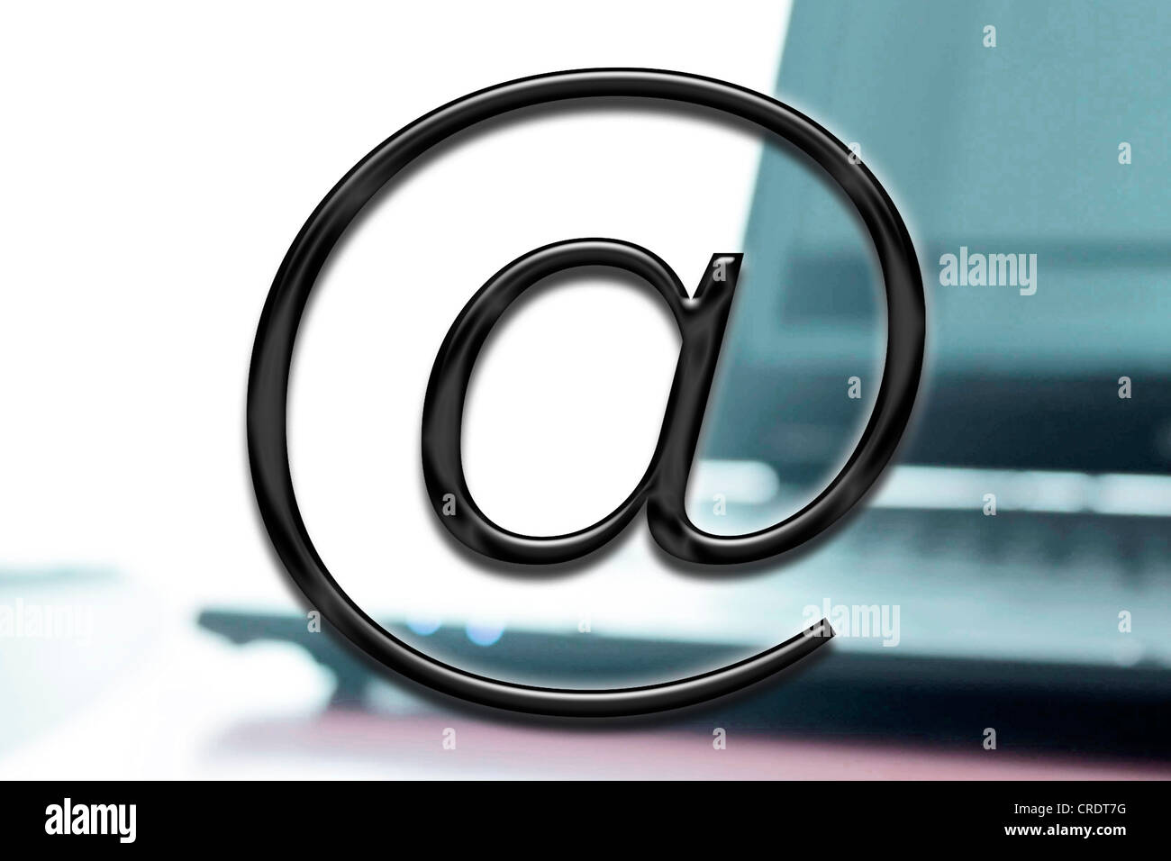 At sign with laptop Stock Photo - Alamy