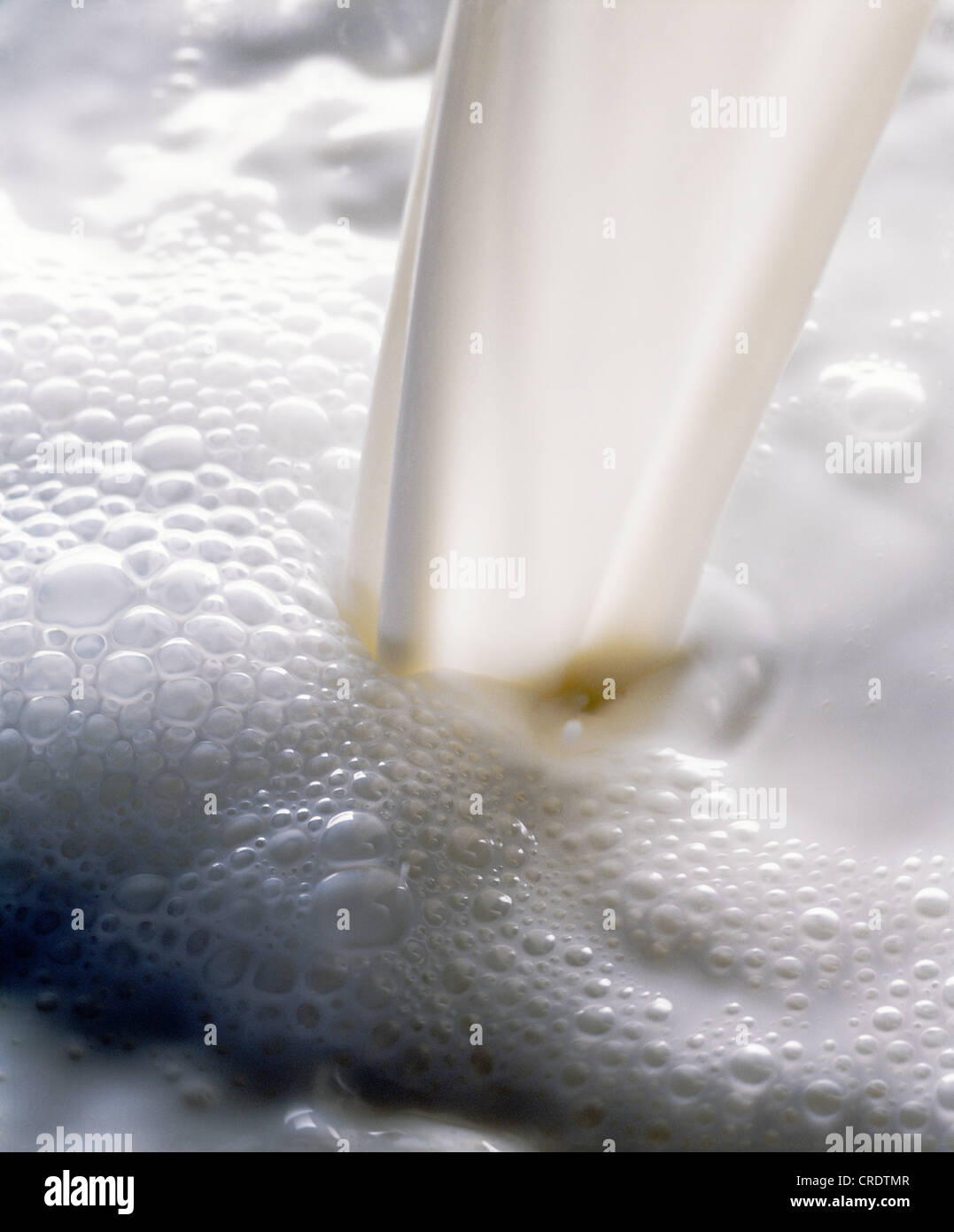 SWIRLING MILK / STUDIO Stock Photo - Alamy
