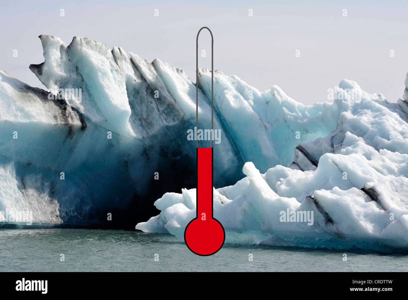 Melting ice, thermometer, symbolic image global warming, climate change ...