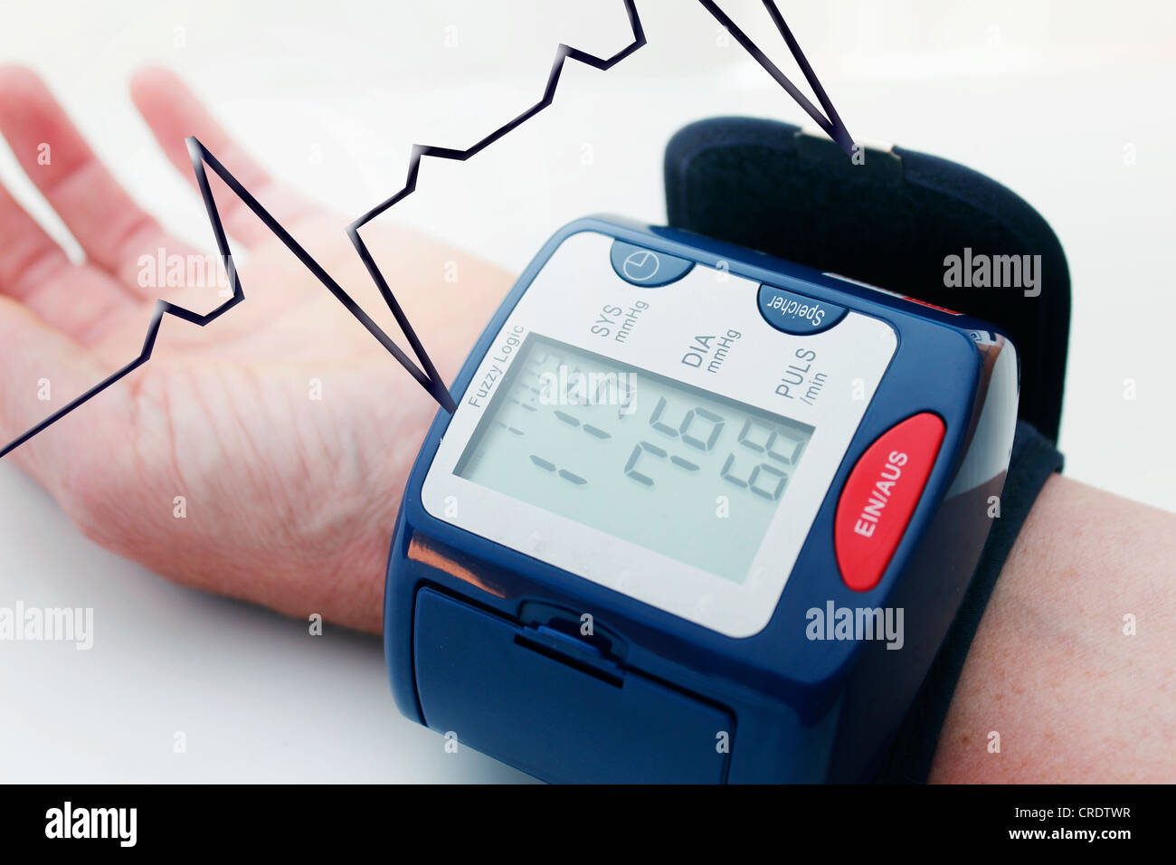 Digital blood pressure meter showing normal figures, and a heart rate ...