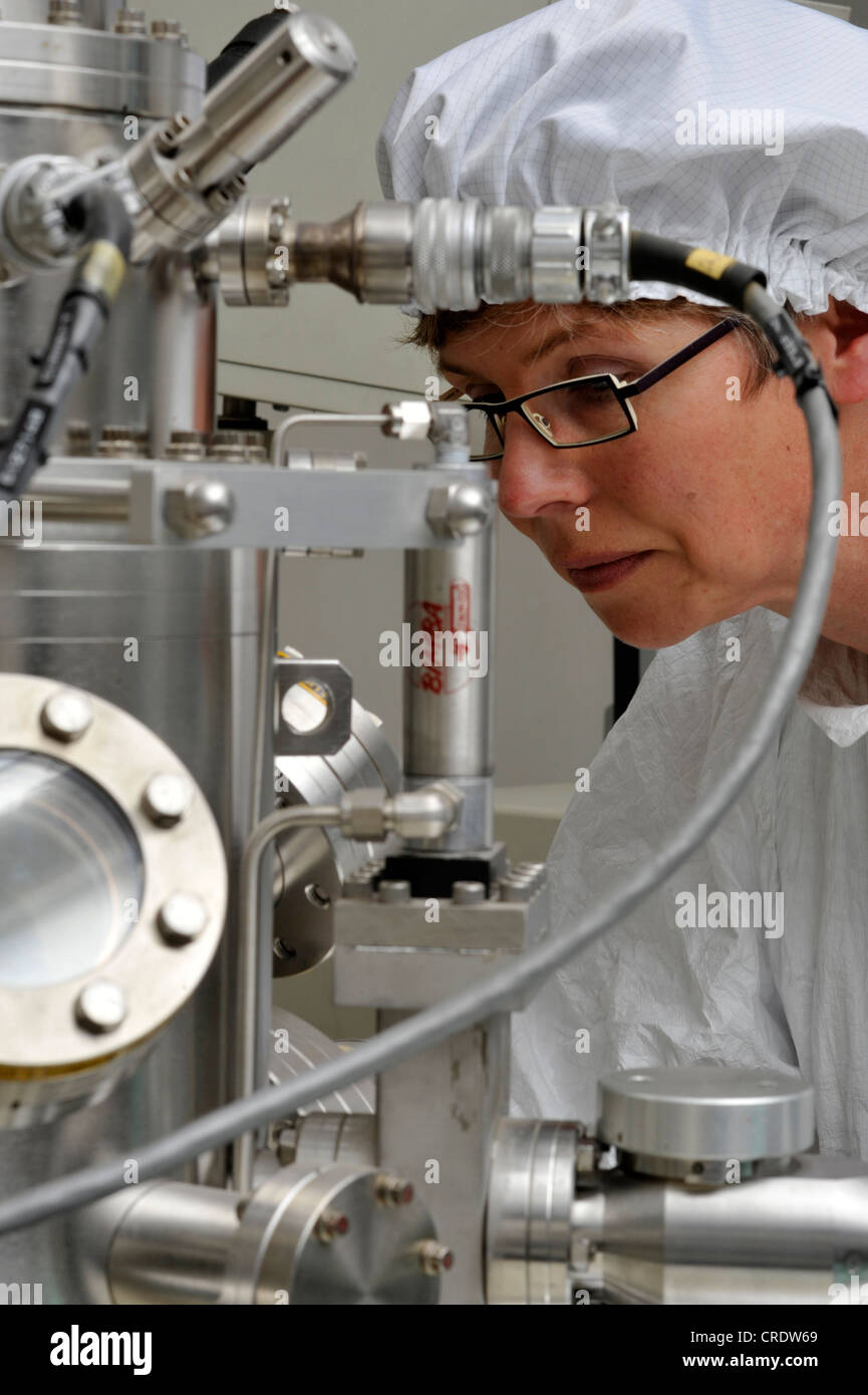Scientist using an Auger electron spectrometer Stock Photo - Alamy