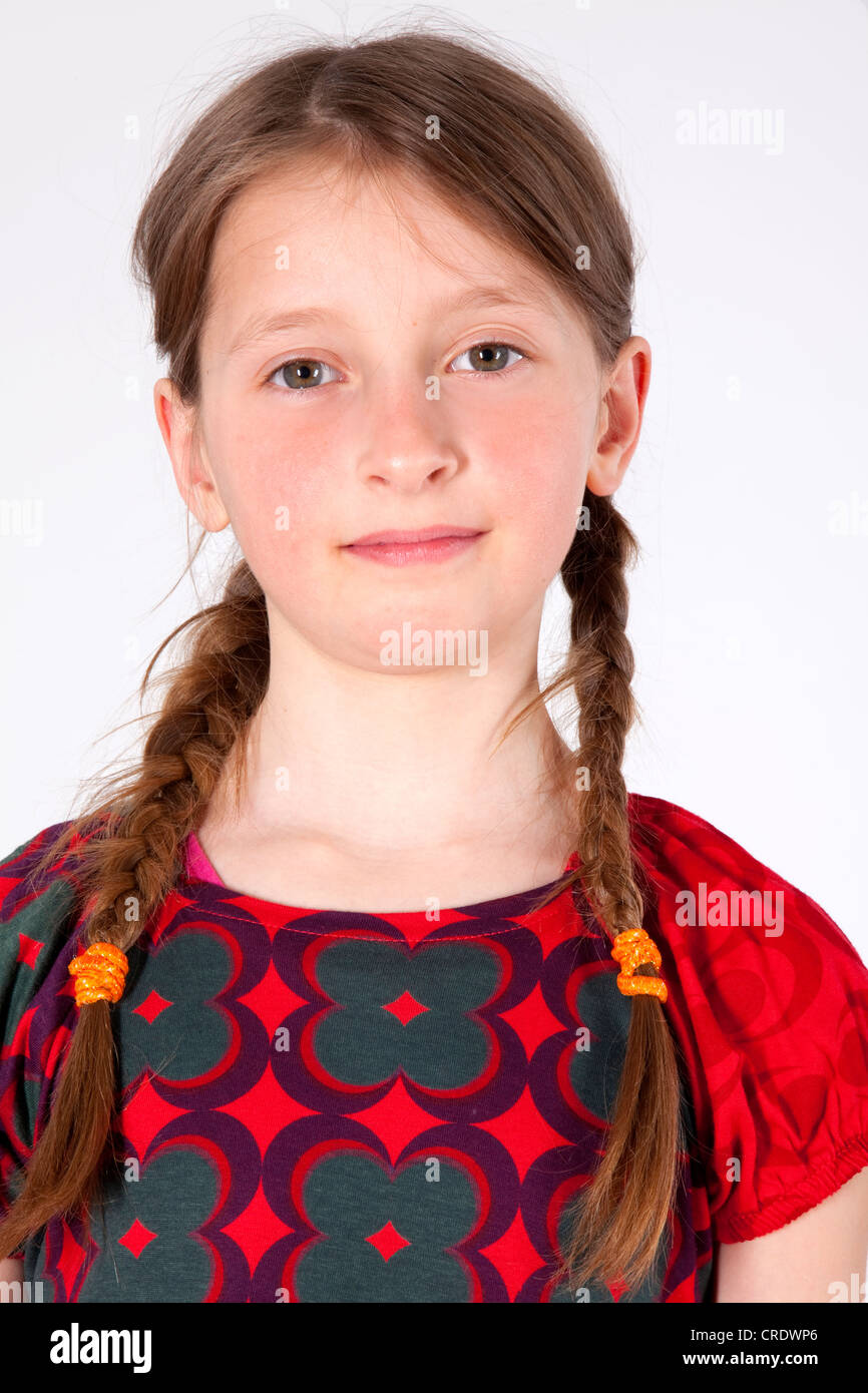 Girl age 8 brown hair braids hi-res stock photography and images - Alamy