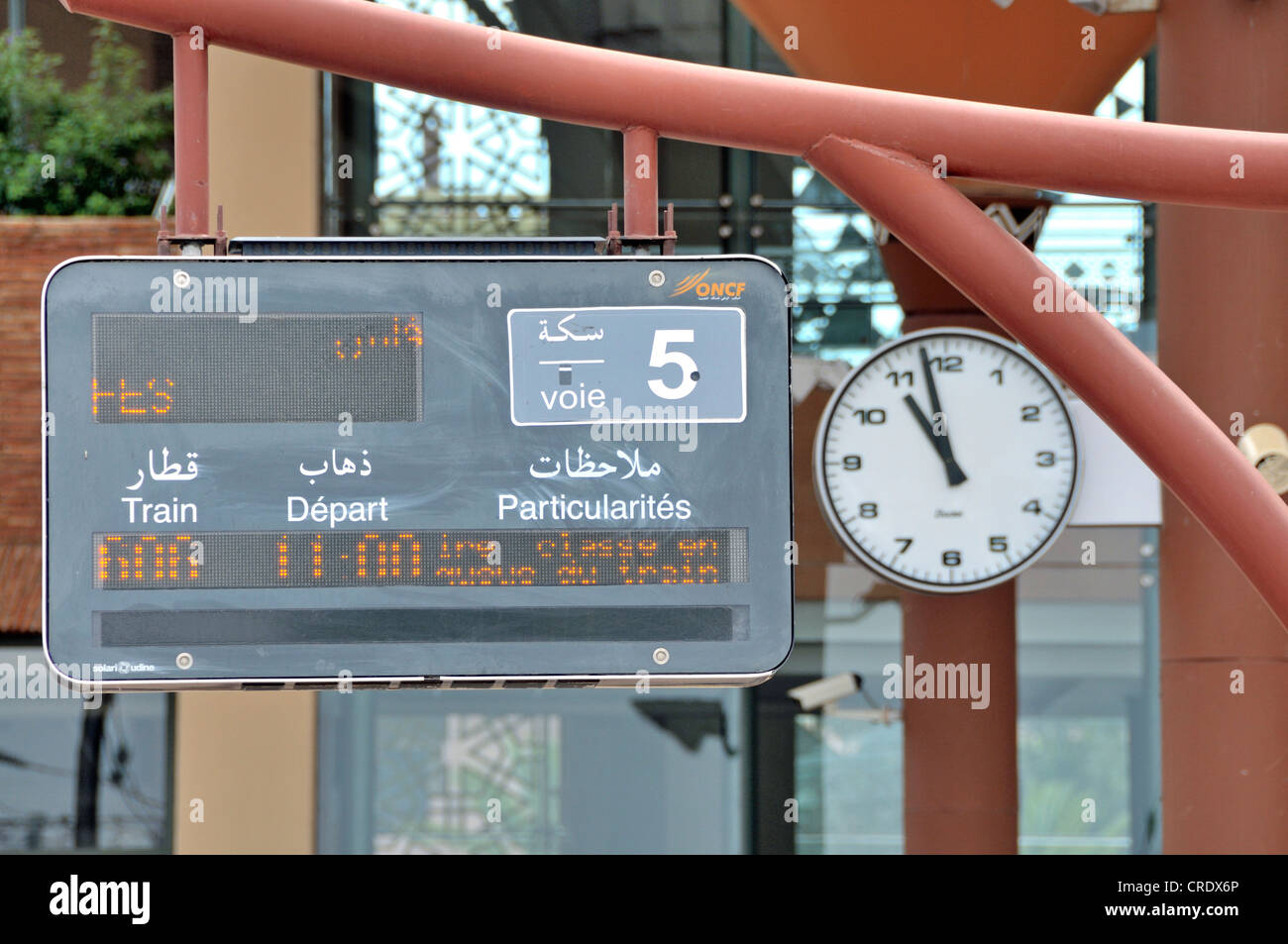 Information sign and clock, train station in Meknes, Morocco, Africa ...