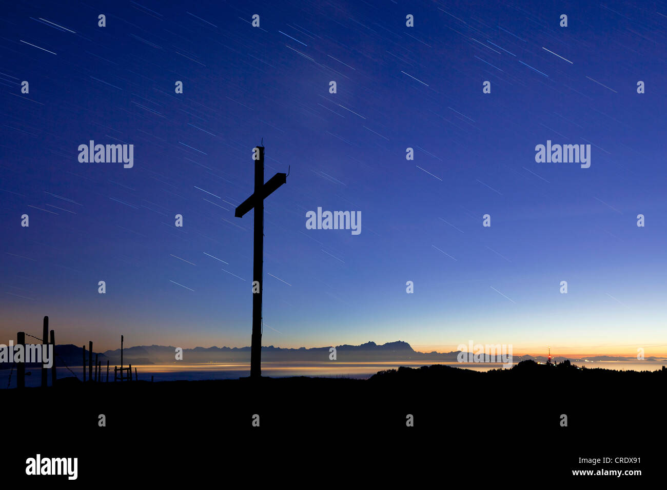 View from Mt Hirschberg with summit cross across high fog to the ...