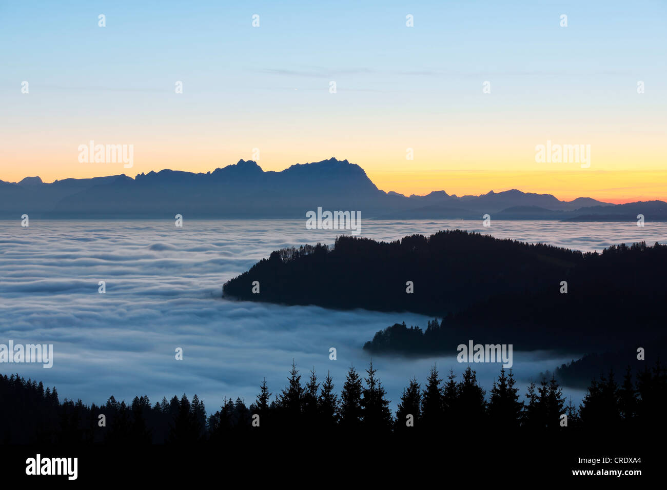 High fog in the evening with views of the Alpstein mountain range from ...