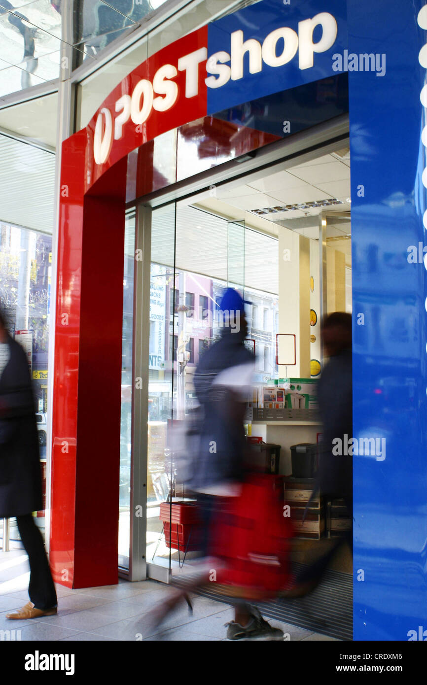 Australia Post shop Enterance. People rushing in and out of the store ...