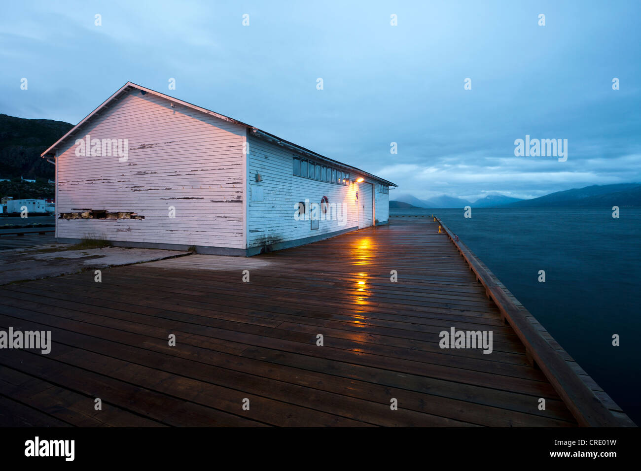 Port of Lodingen at midnight with light rain in the Lofoten Islands ...