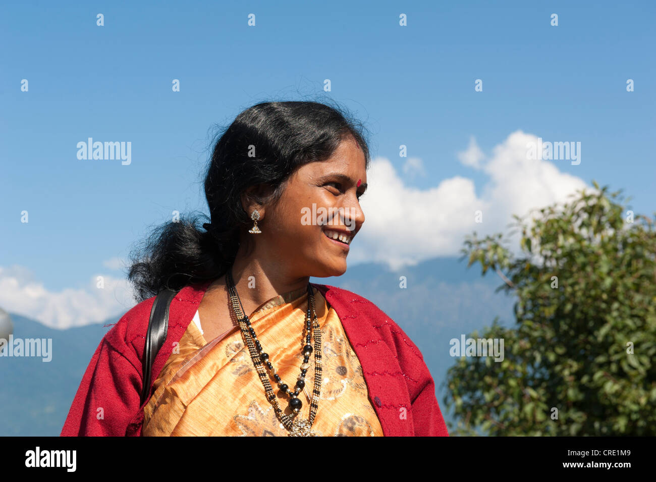 Indian woman smiling, portrait, Tashi Viewpoint, mountains near Gangtok ...