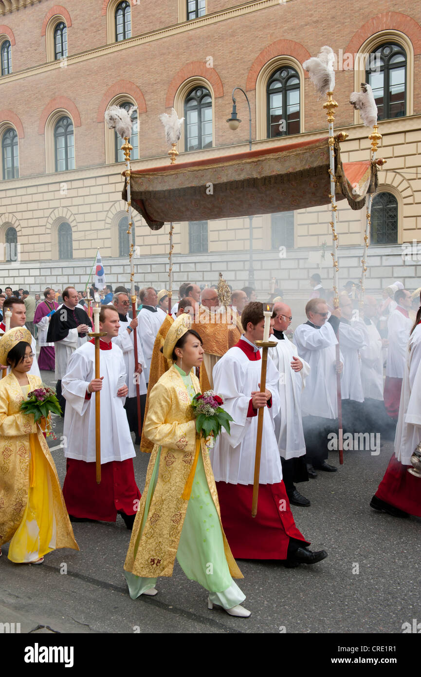 Catholic Corpus Christi procession, Archbishop Reinhard Marx carrying ...