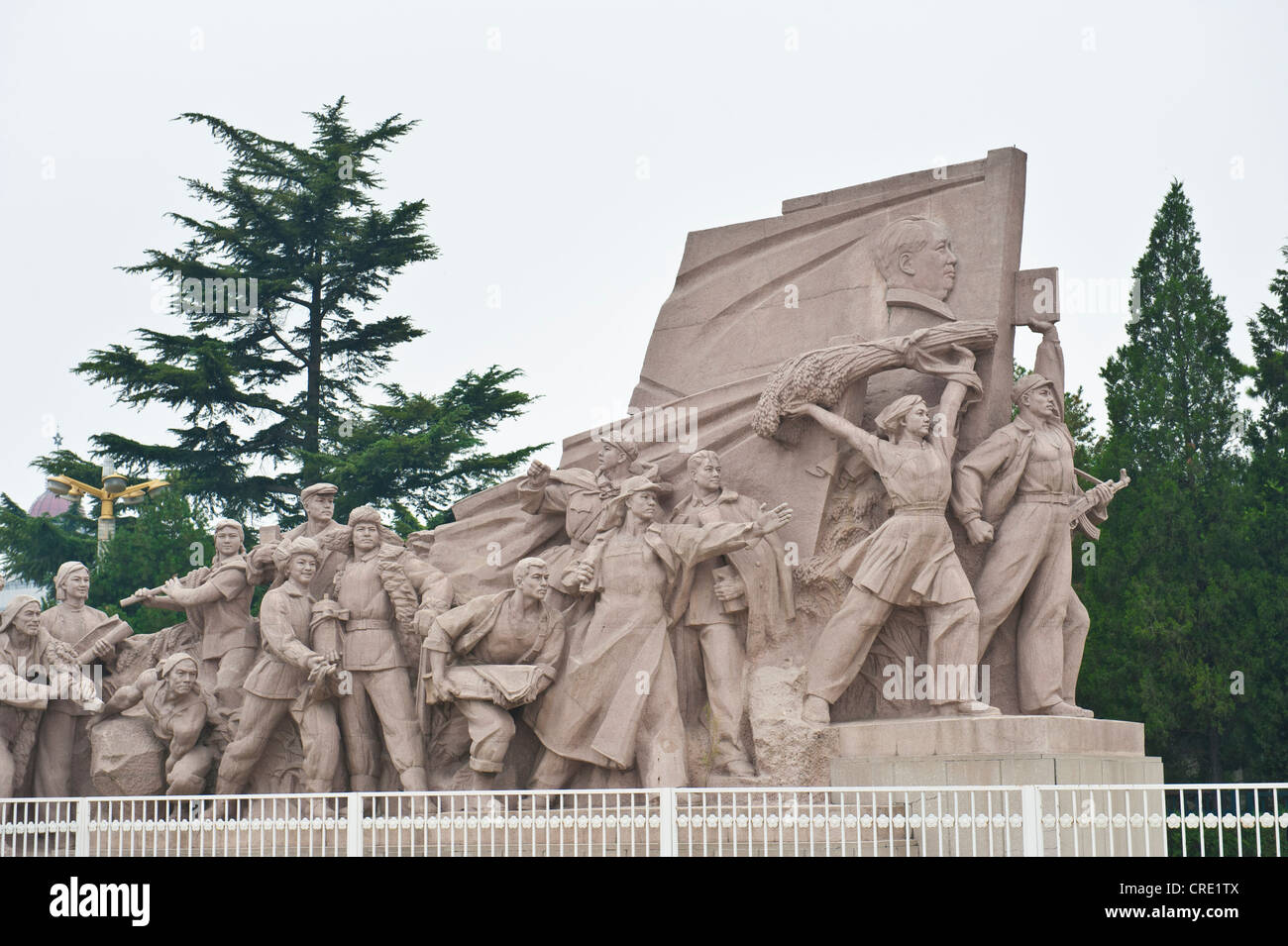 Communist stone monument, people with the flag of Mao Zedong, Tiananmen ...