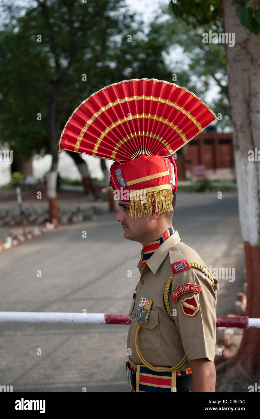 Indian border guard wearing a hat like a cockscomb and a uniform ...