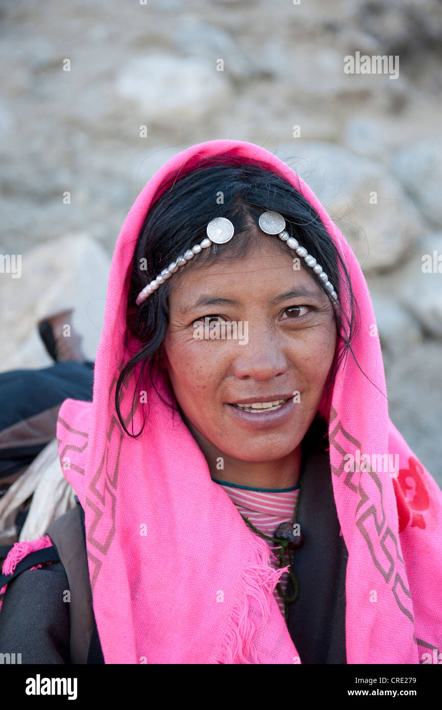 Tibetan Buddhism, portrait, pilgrim wearing a pink headscarf ...