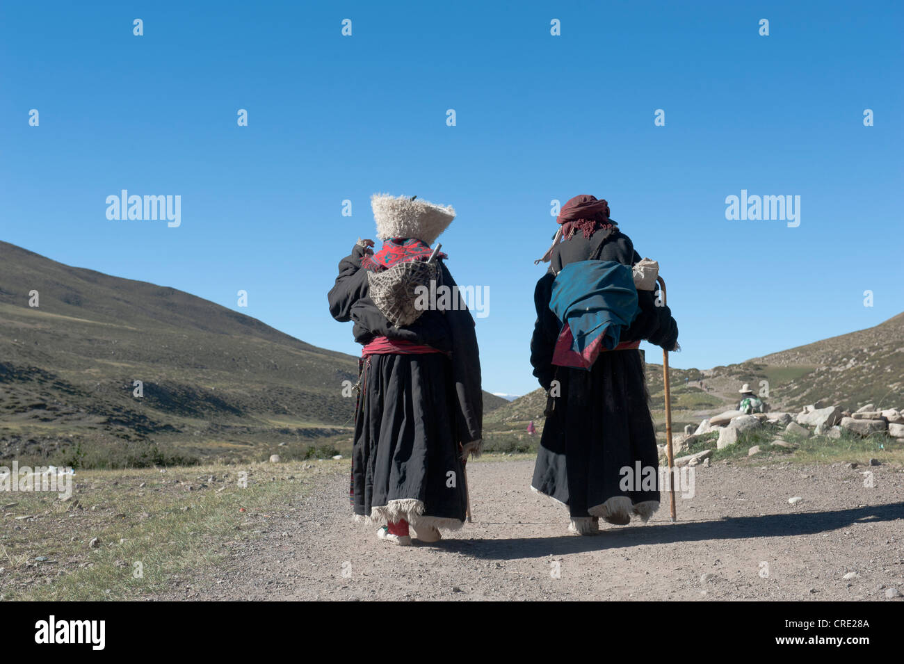 Tibetan Buddhist, pilgrims dressed in traditional costume near the ...