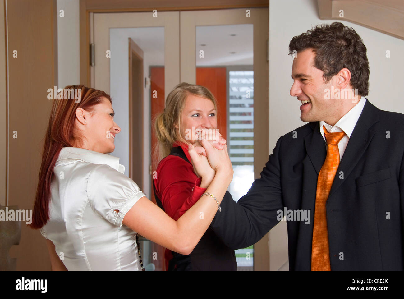 Three businessmen cheering hi-res stock photography and images - Alamy