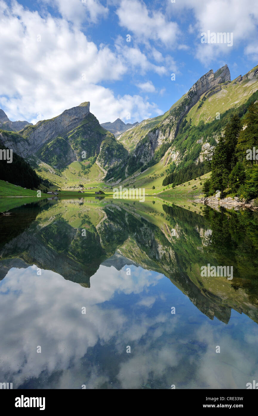 Lake Seealpsee in the Alpstein mountains, behind Mt. Saentis, Wasserau ...
