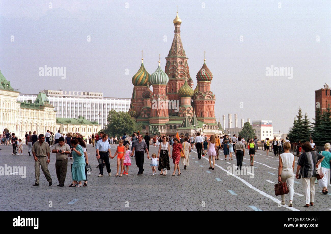 Moscow, people and Saint Basil's Cathedral on Red Square Stock Photo ...