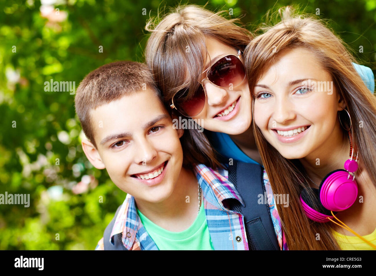 Adorable teenagers spending time outdoors in summer Stock Photo - Alamy