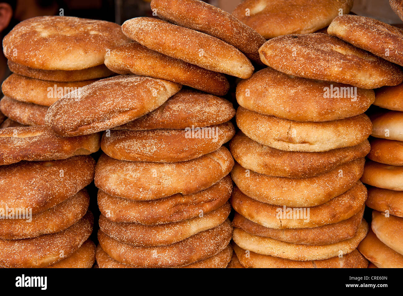 Piles of fresh pita bread at a stall, Marrakech, Morocco, Africa Stock ...
