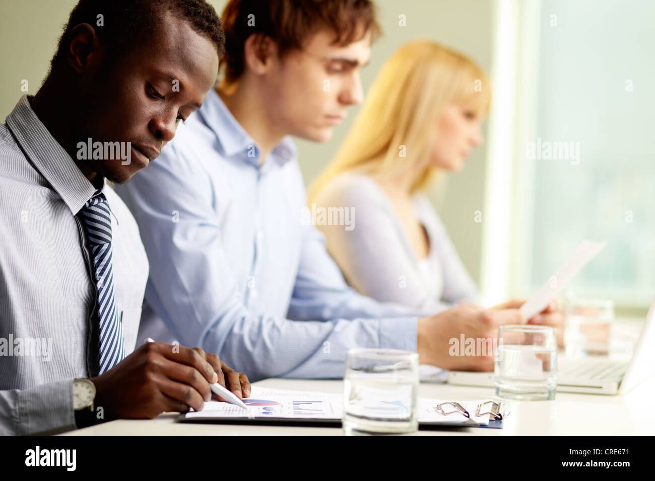Group of business people taking their everyday work seriously Stock ...