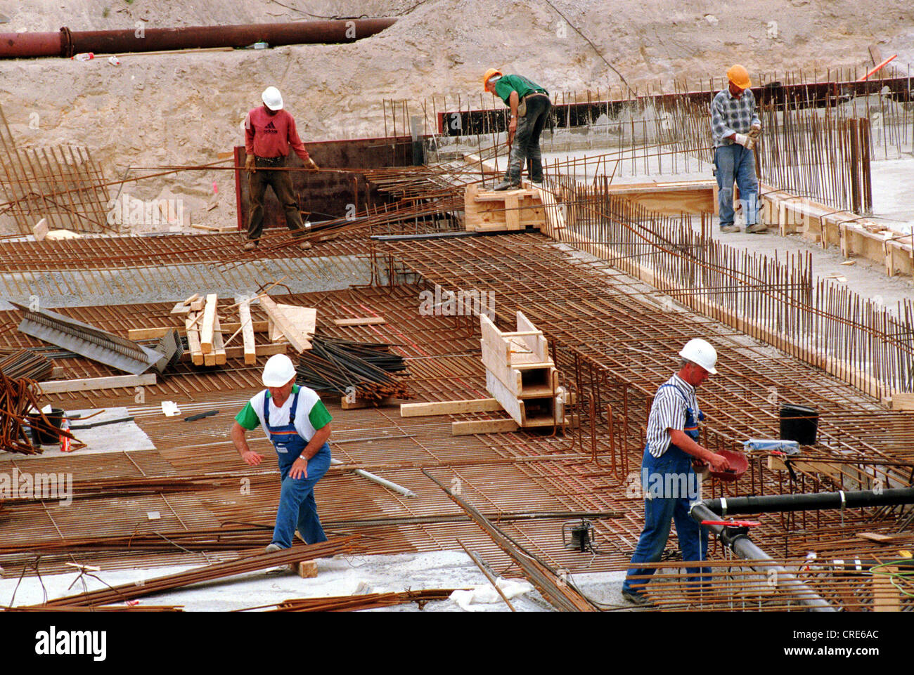 Construction workers at a construction site at Potsdamer Platz, Berlin ...
