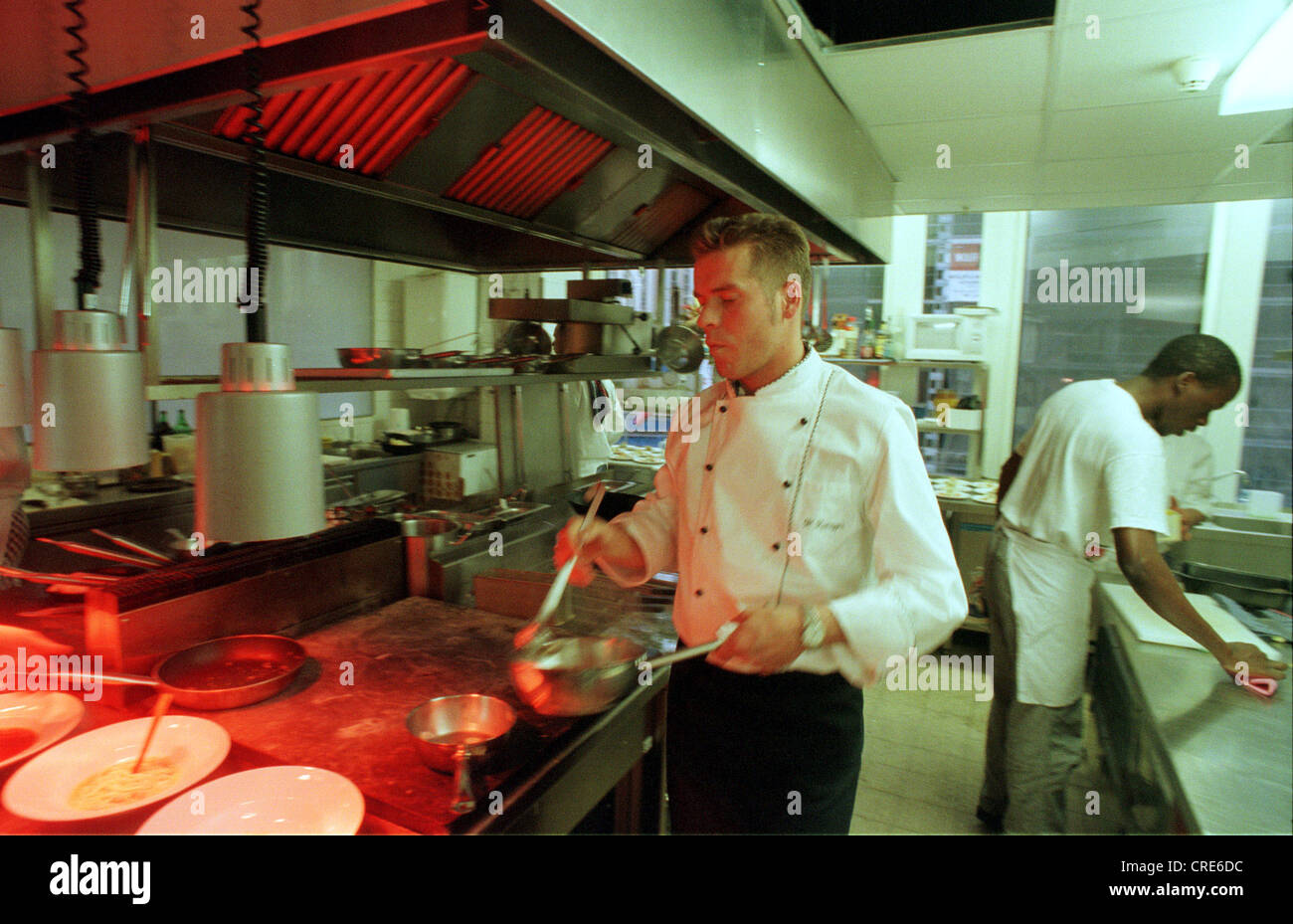 Cooking in the kitchen of the restaurant Langhans in Berlin-Mitte ...