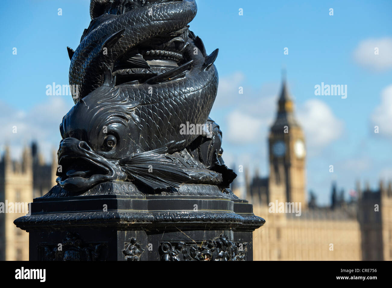 Vulliamy's dolphin lamp posts against a blue sky along the South bank ...