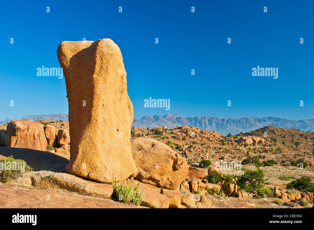 Large granite boulders on a rock ledge, Anti-Atlas Mountains, southern ...